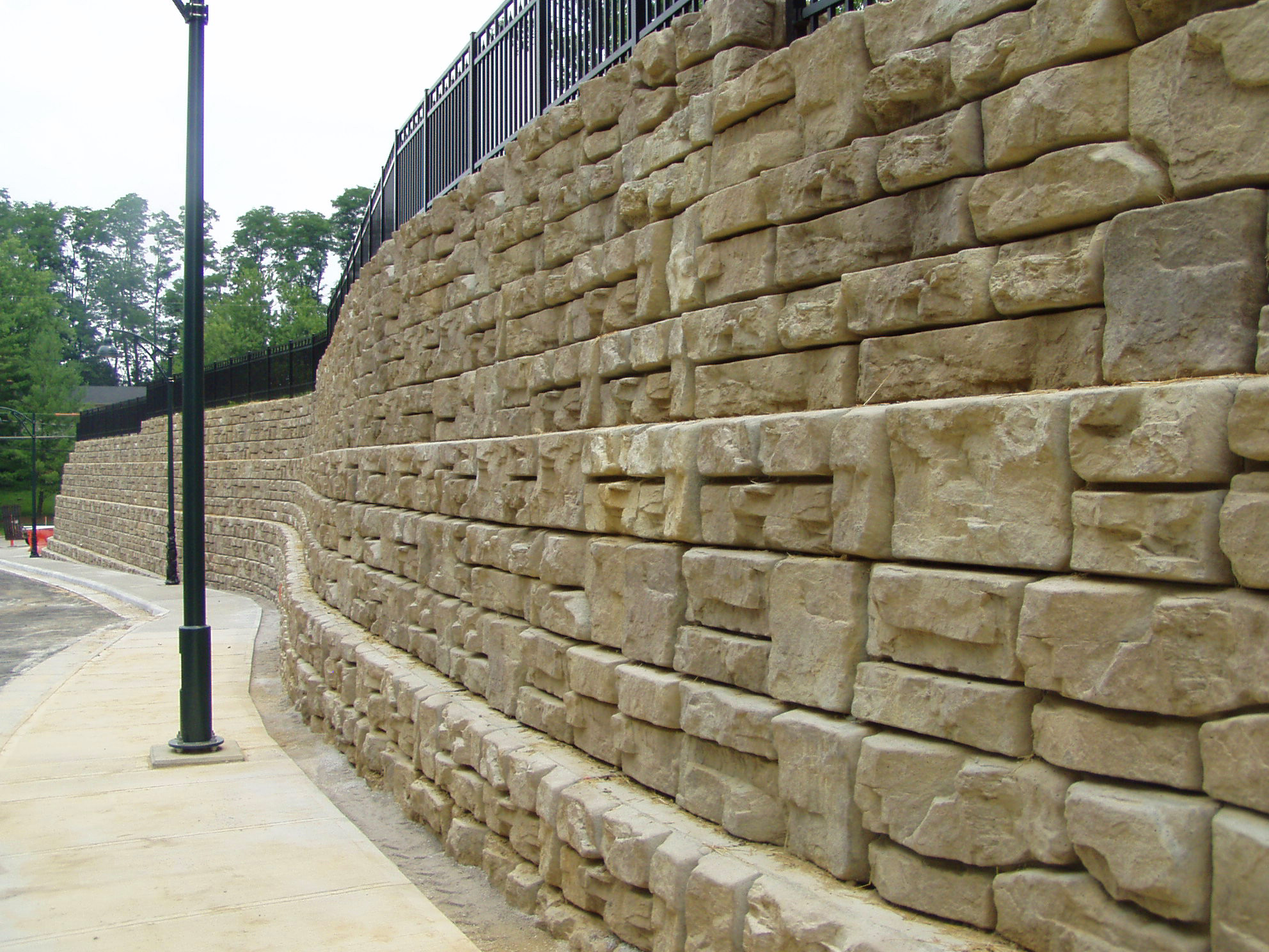 The Advantages of Using Gravity Walls for Earth Retention - Redi-Rock ...